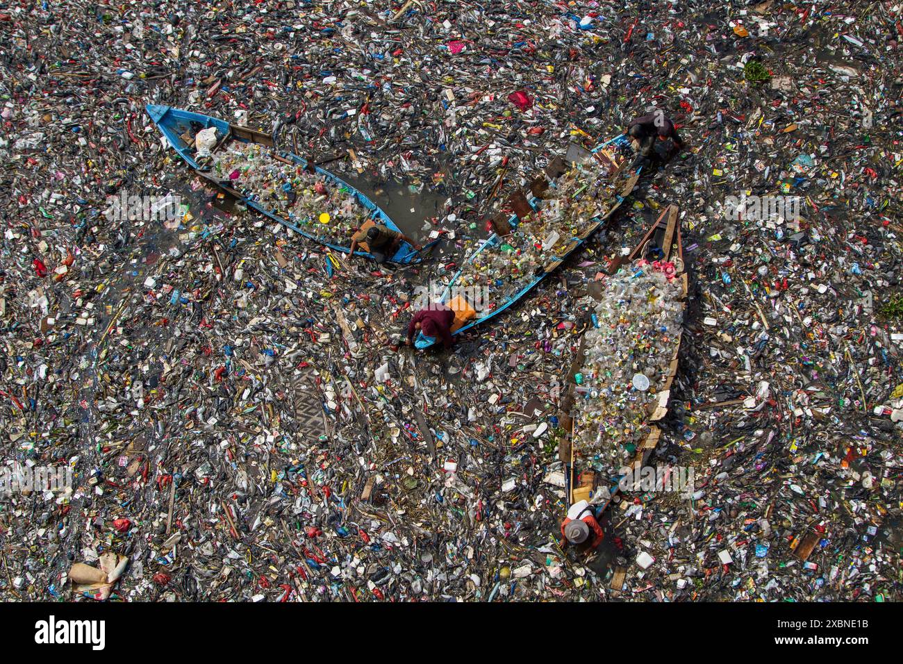 June 12, 2024, Bandung, West Java, Indonesia: Residents on boats are ...