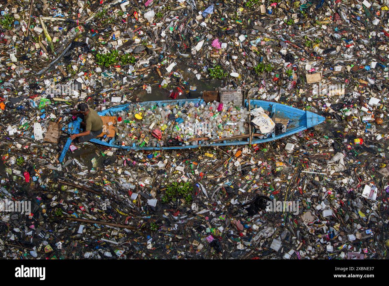 June 12, 2024, Bandung, West Java, Indonesia: Residents on boats are ...