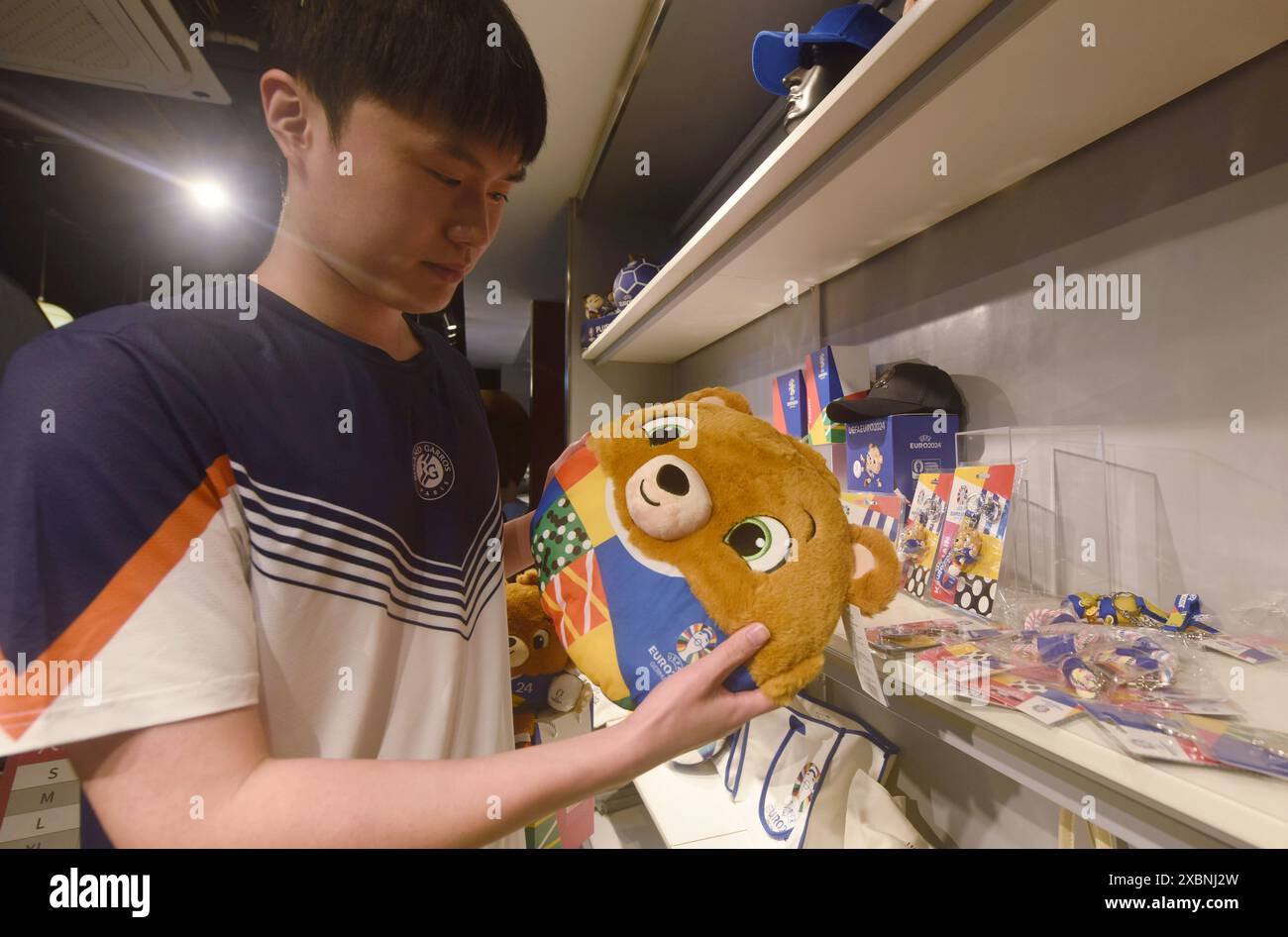 HANGZHOU, CHINA - JUNE 13, 2024 - Customers buy a plush toy "Albart ...