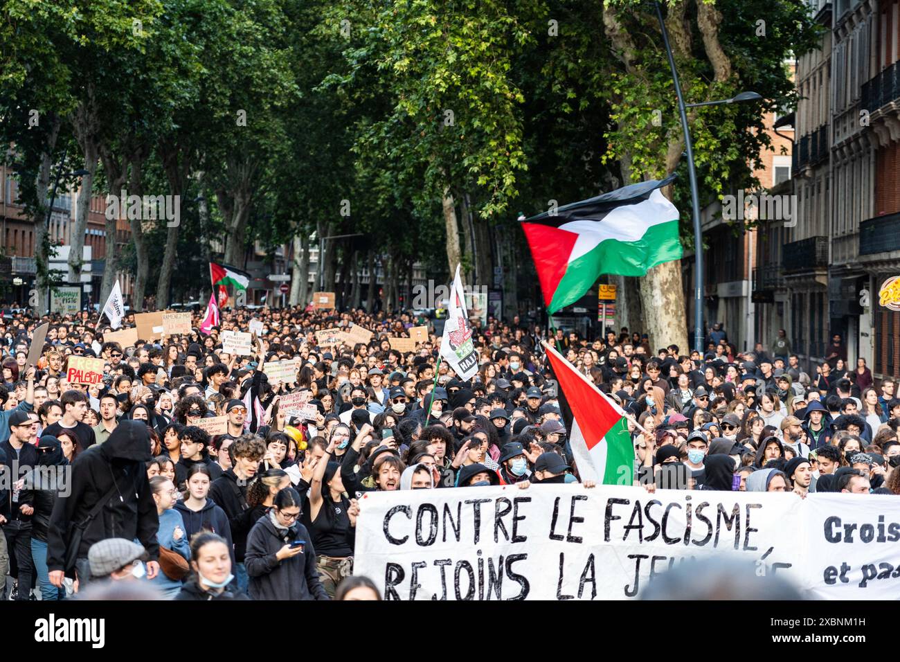 Demonstrators march during an anti far-right rally following the ...