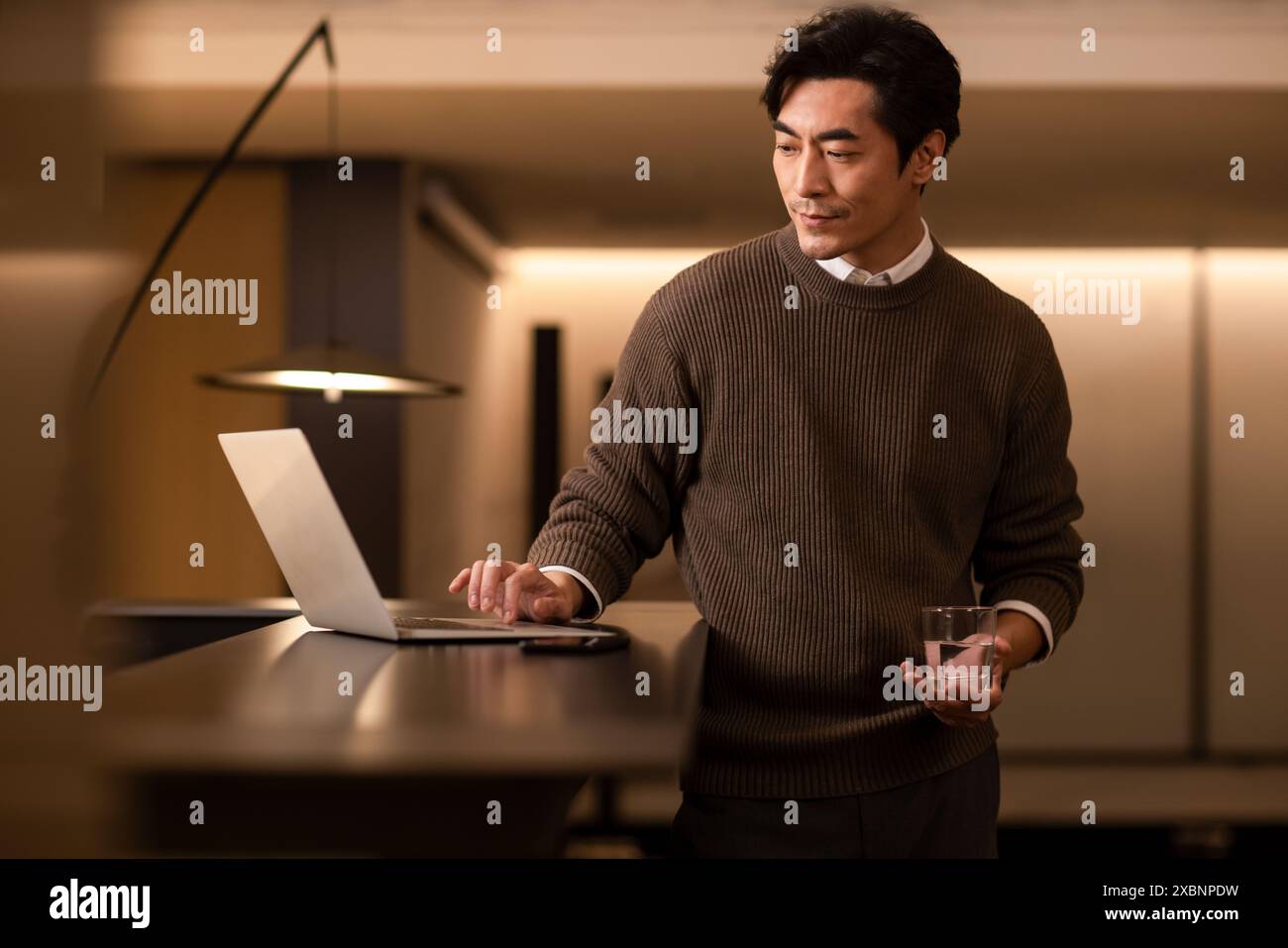 Serious man from east working hi-res stock photography and images - Alamy