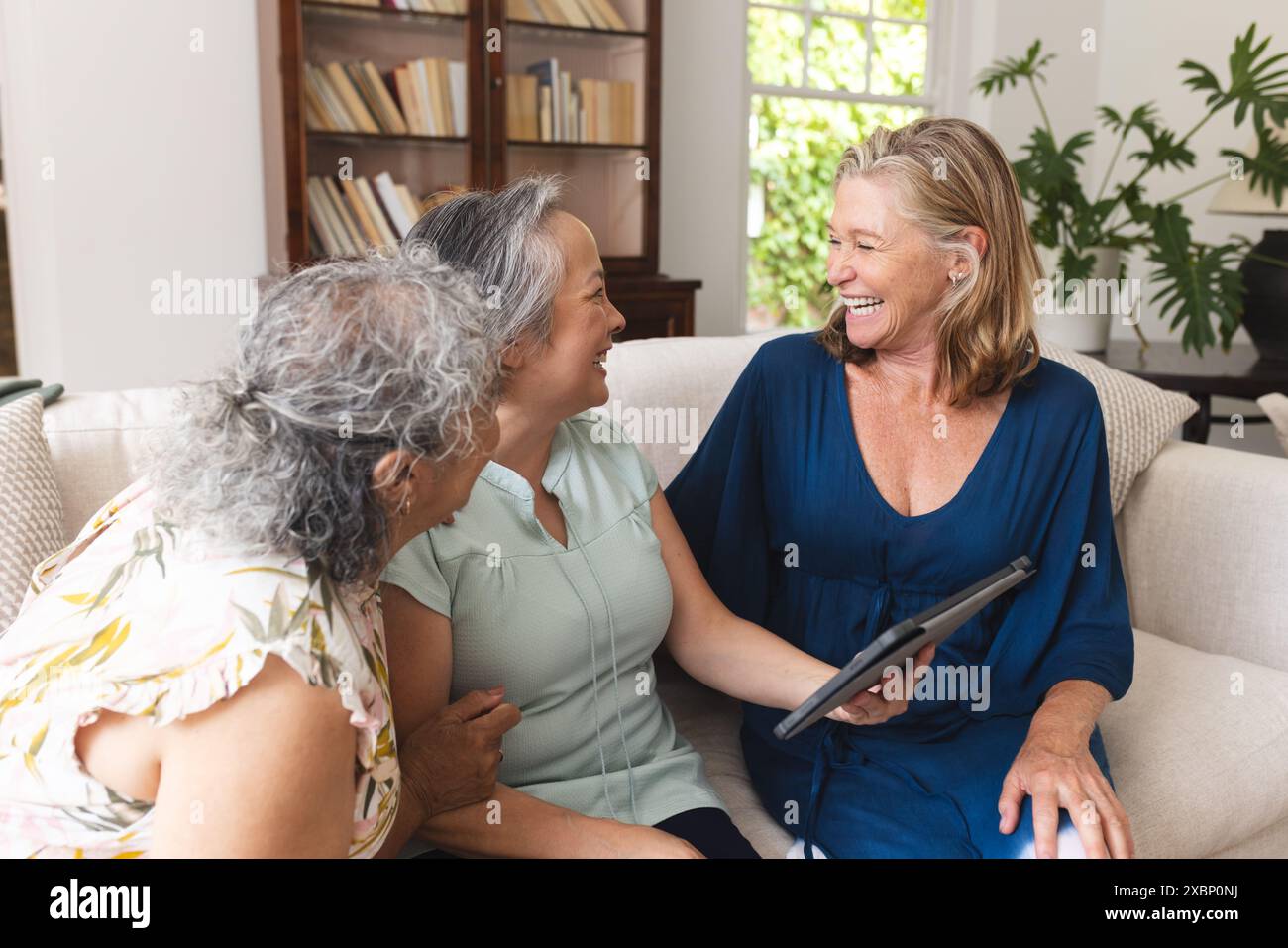 Happy diverse senior women using hi-res stock photography and images ...