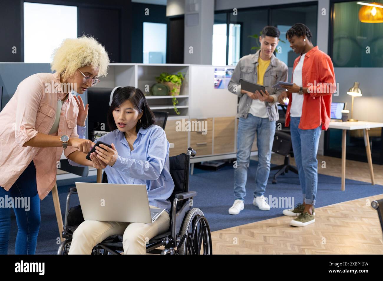 Group of workers collaborates on hi-res stock photography and images ...