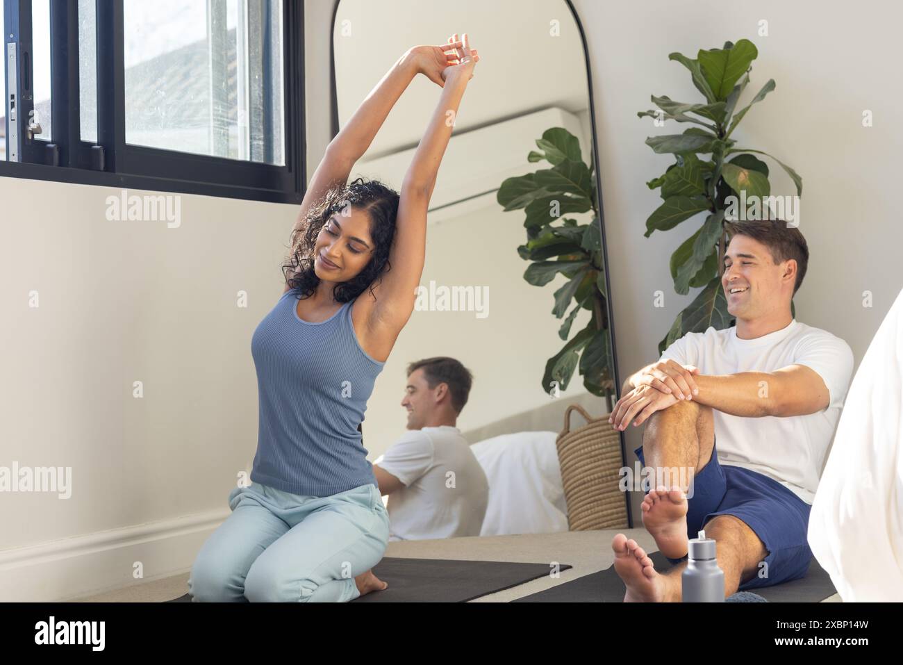 Young couple practice stretching together hi-res stock photography and ...