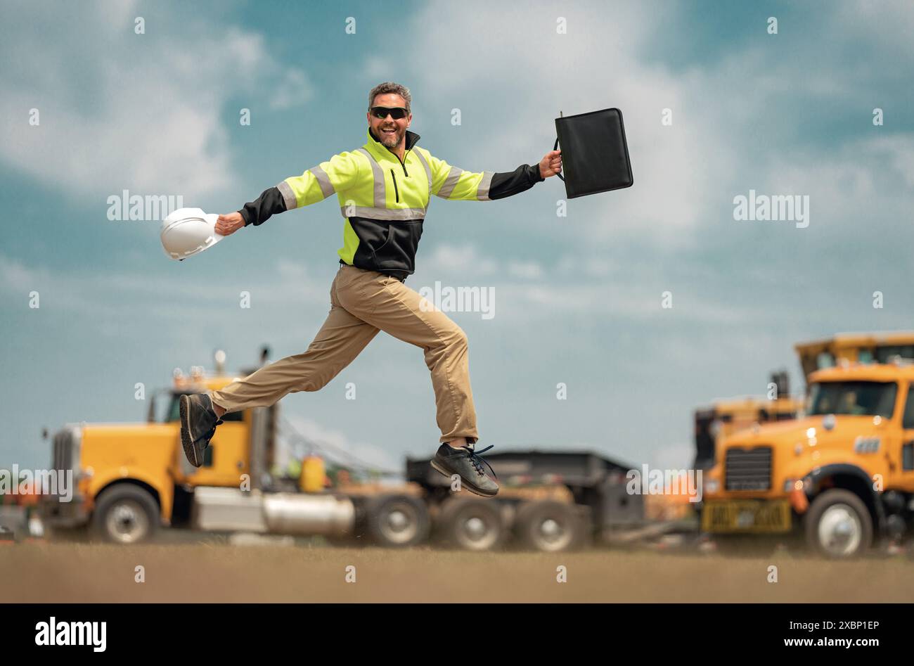 Construction builder excited jump hi-res stock photography and images ...
