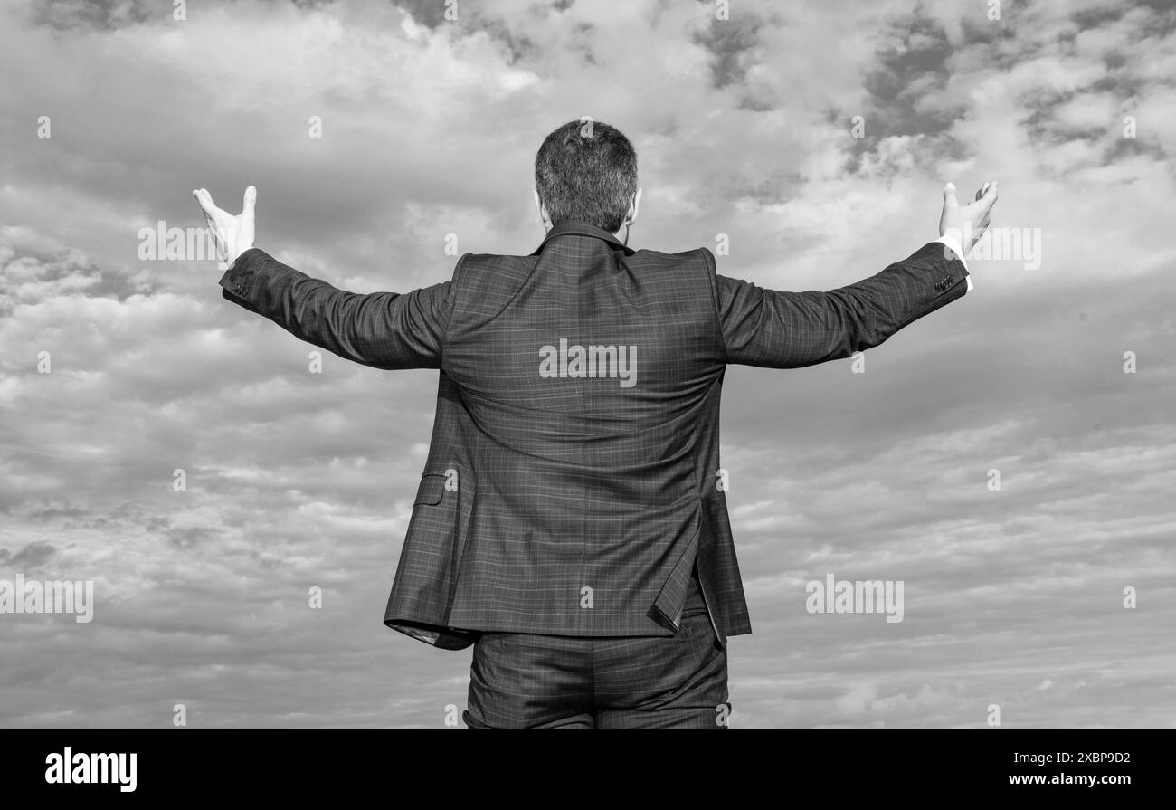 back view of successful business man in suit. photo of successful ...
