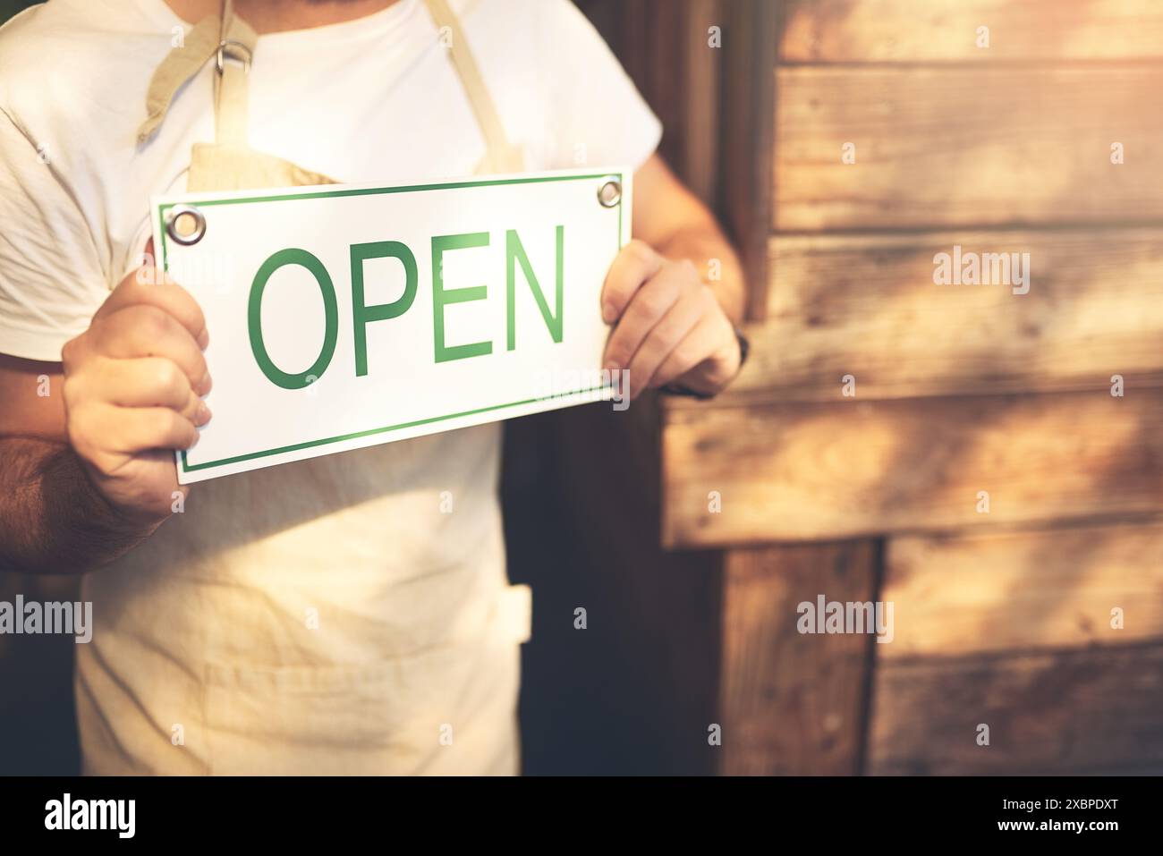 Hands, waiter and man at cafe with open sign in startup growth and ...