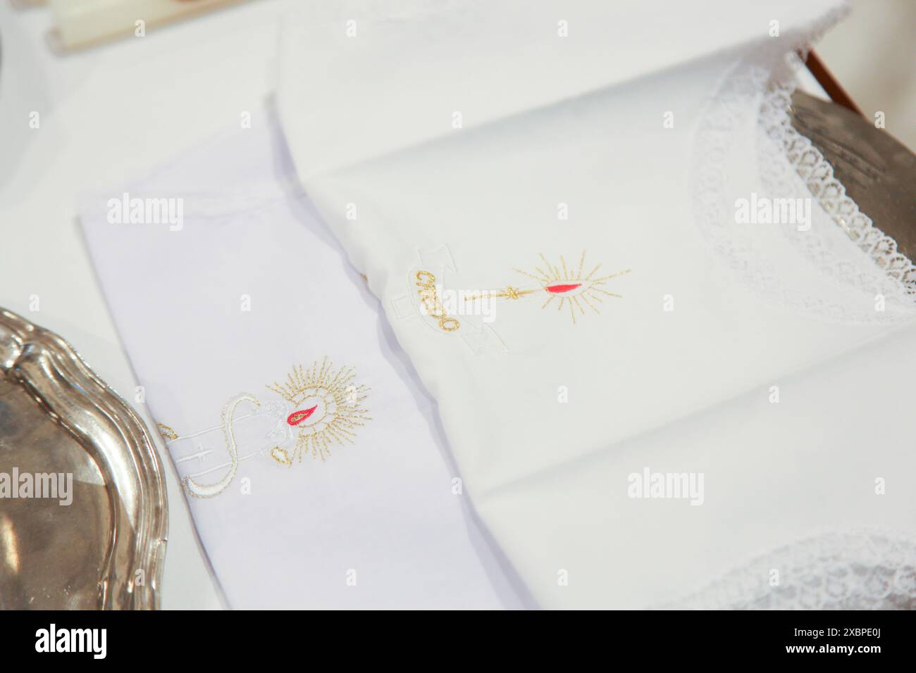 Two priest stoles with white fabric and intricate gold and red faith ...