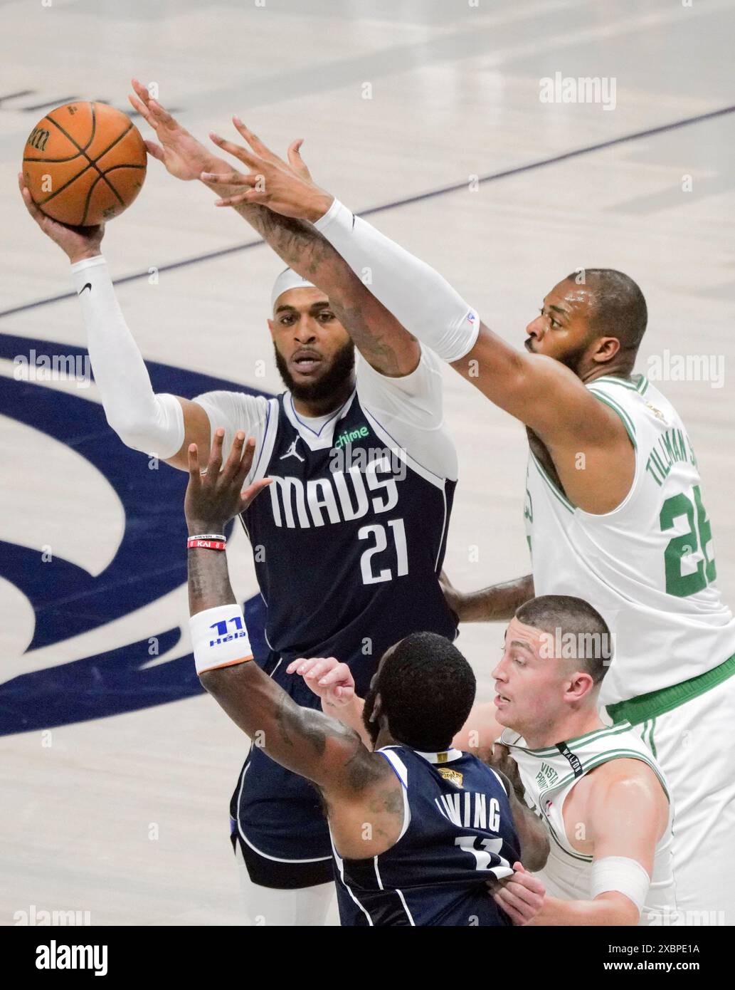 Dallas, USA. 12th June, 2024. Daniel Gafford (top L) of Dallas ...