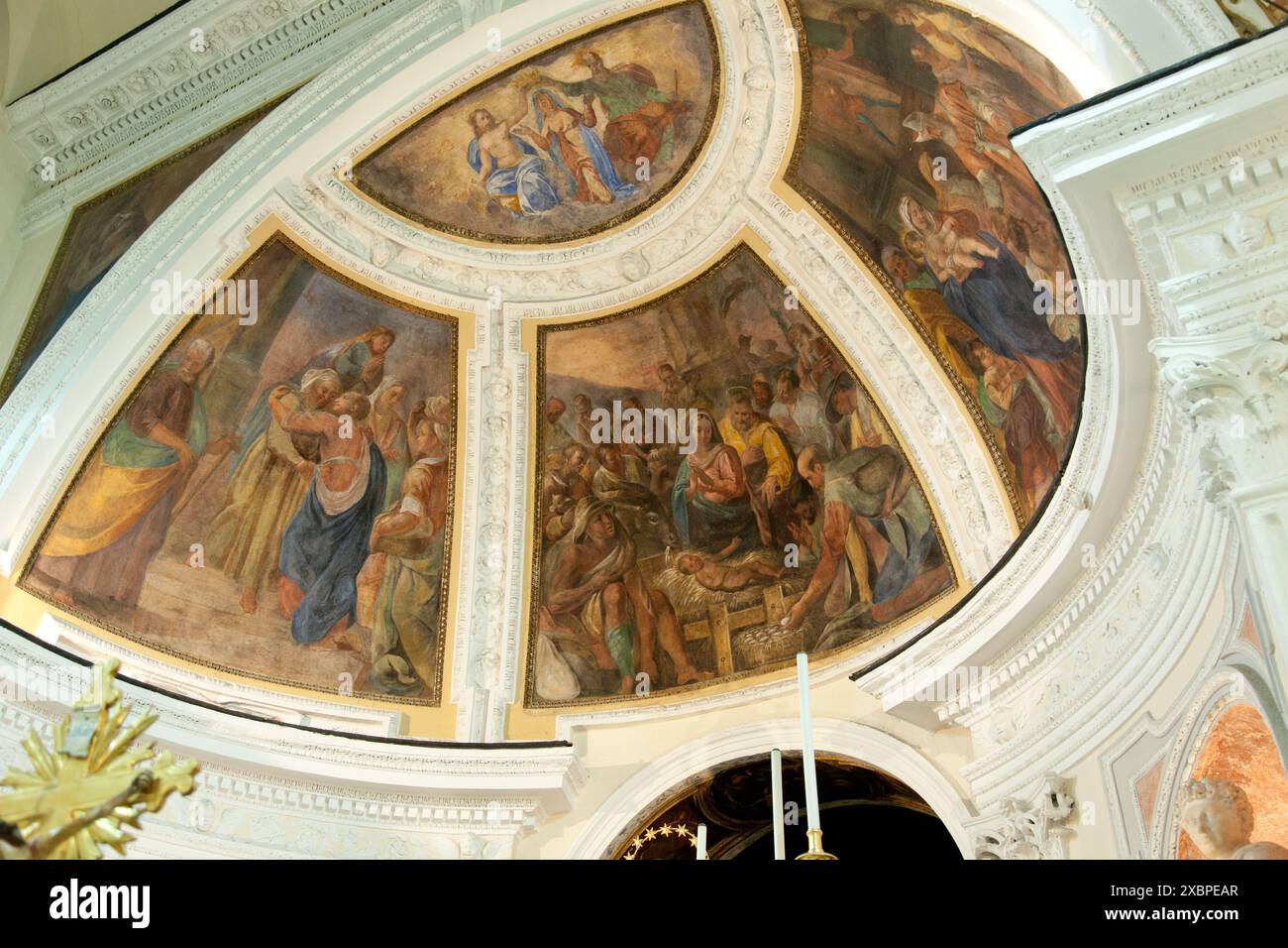 Frescoes depicting scenes from the life of jesus christ decorating the ceiling of a church ...