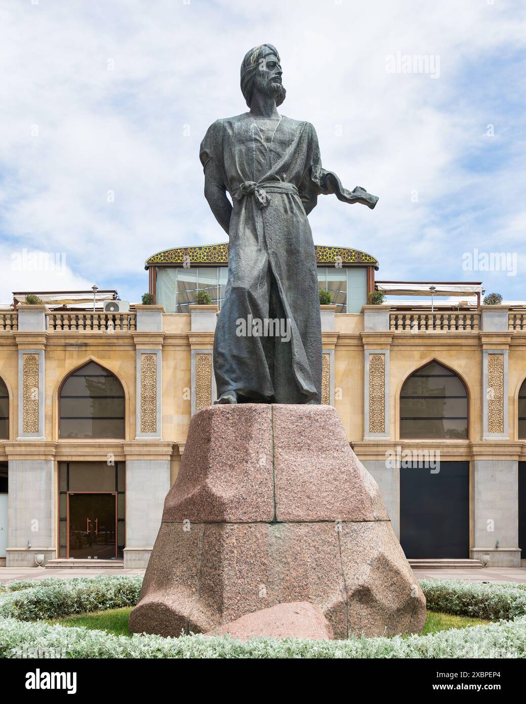 The Nasimi monument in Baku, Azerbaijan. The statue depicts the famous ...
