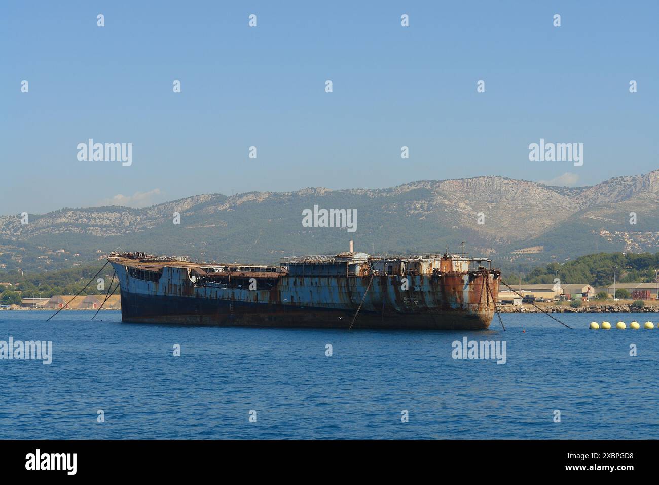 Old hull of oil tanker La Saone used as a breakwater on the island of ...