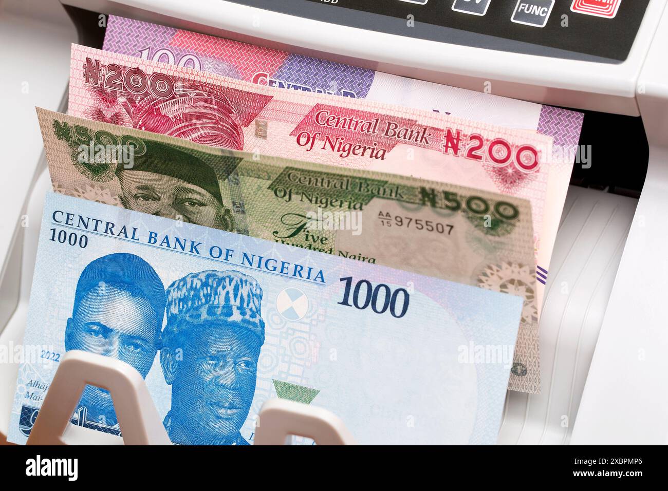 Nigerian money naira in a counting machine Stock Photo Alamy