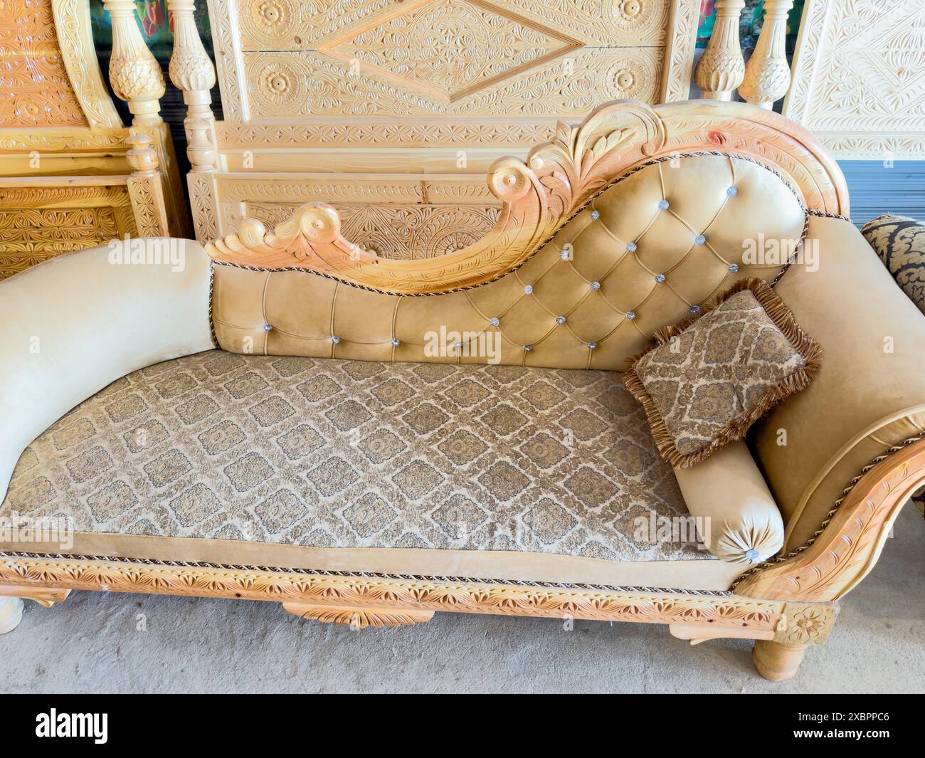 Classic Handcrafted Wooden Bed with Ornate Carvings Stock Photo - Alamy