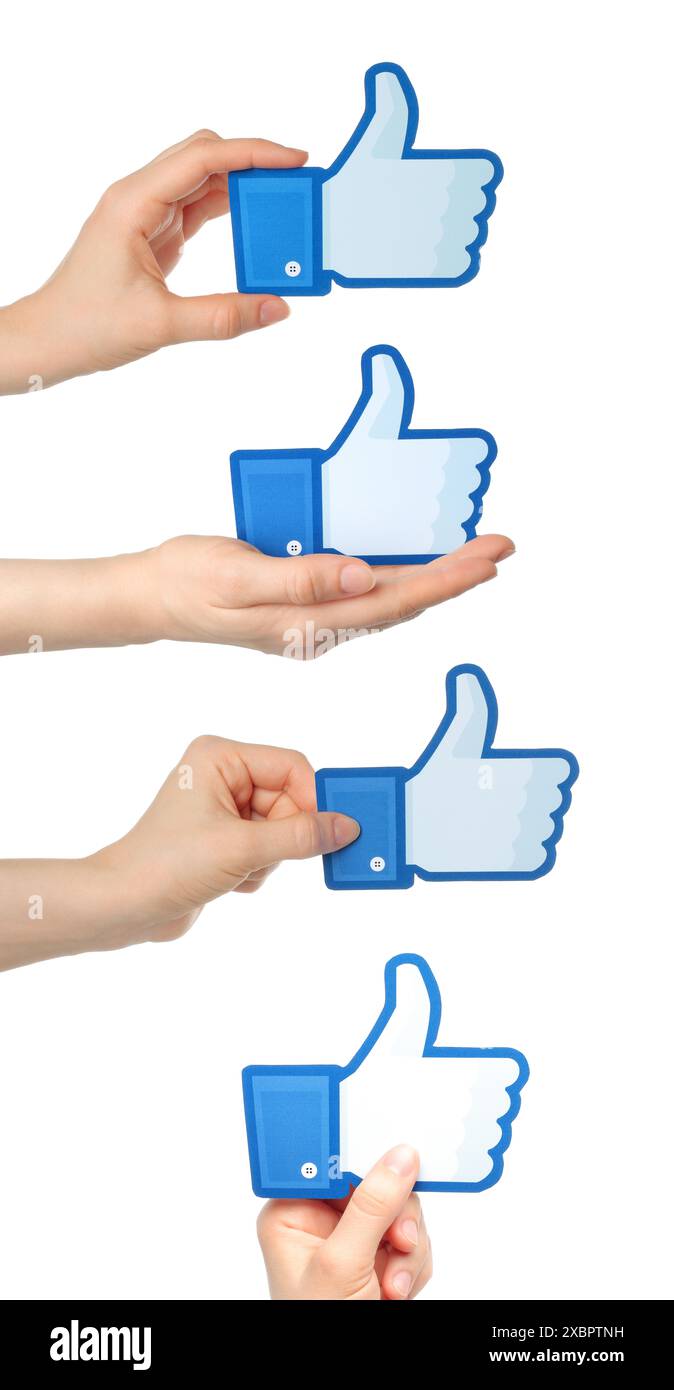 Set of Hands, which holds paper Facebook Like Thumb-Up symbol, isolated ...
