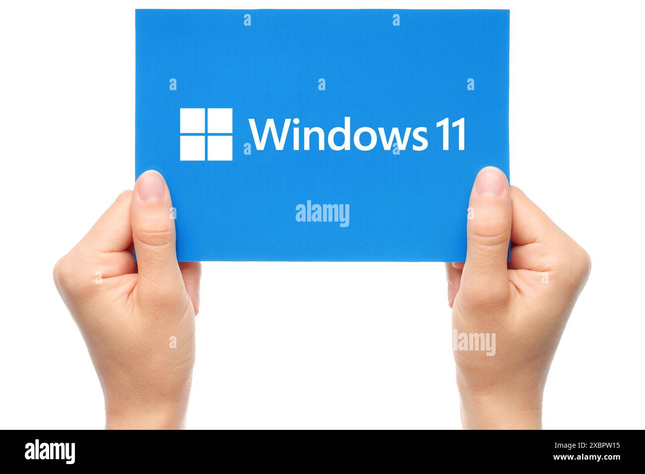 Woman Hand, which holding Windows 11 paper logotype, isolated on a ...