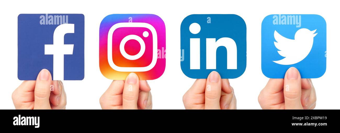 Set of Hands, which holding paper icons of popular social media apps ...