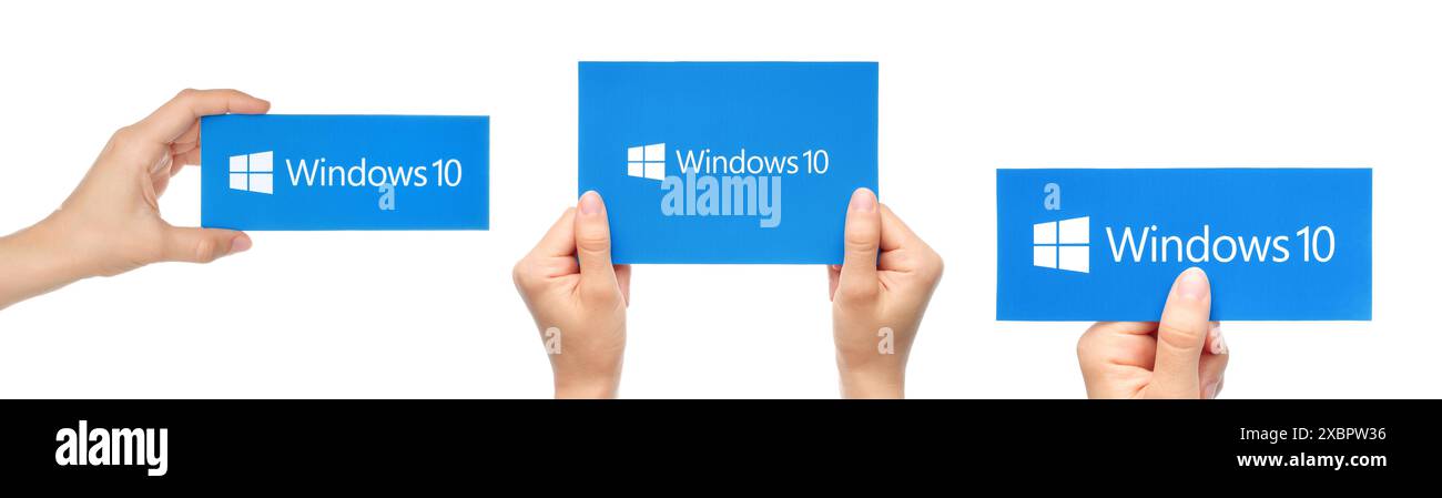 Set of Hands, which holding Windows 10 paper logotype, isolated on a ...