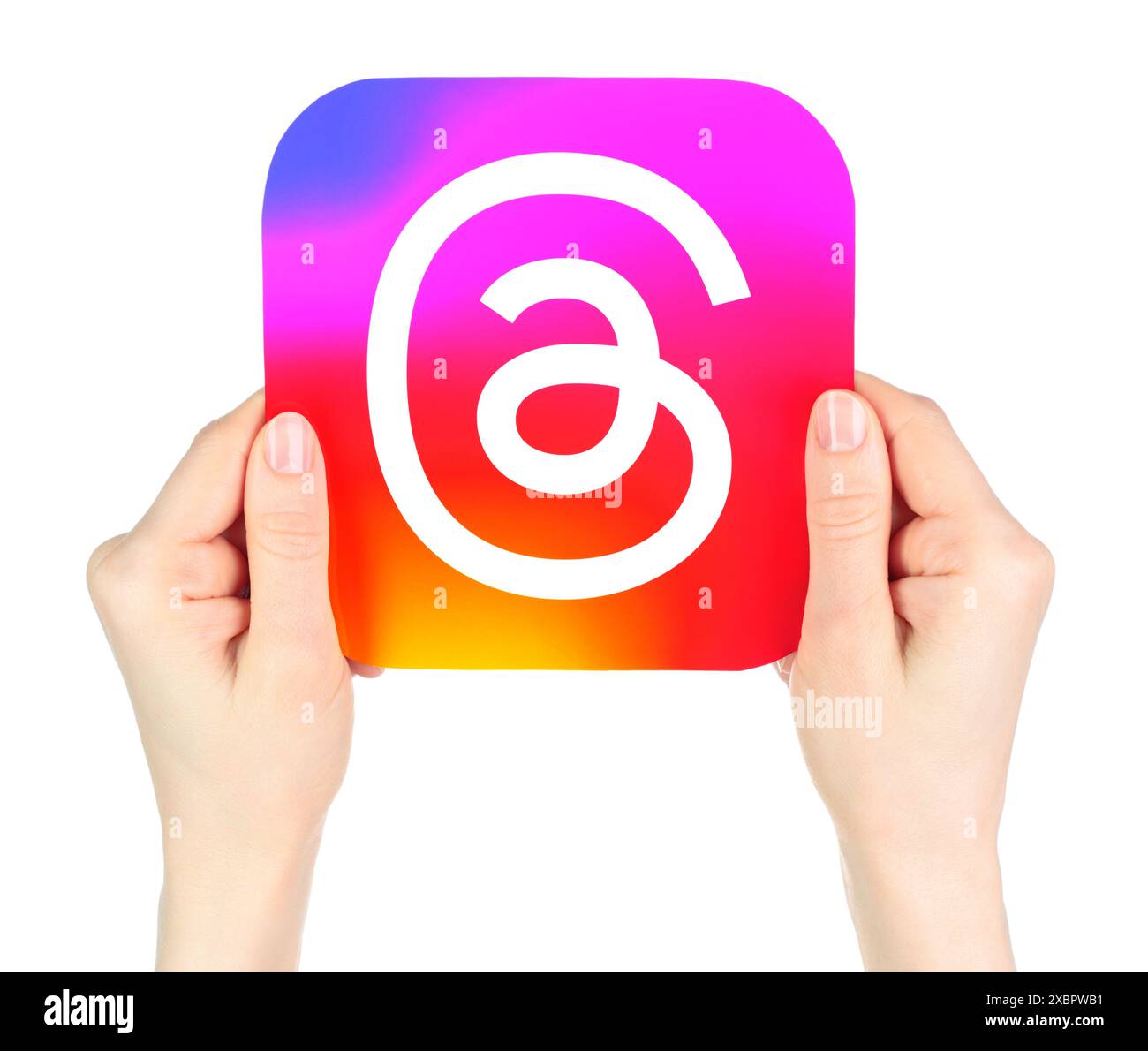 Hands holding paper Threads mobile app icon, on a transparent ...