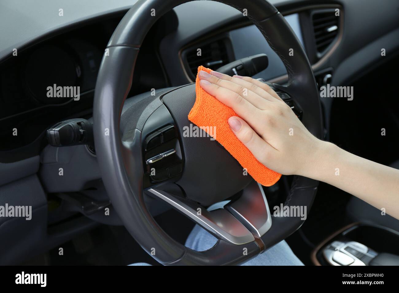 Woman cleaning car interior hi-res stock photography and images - Alamy