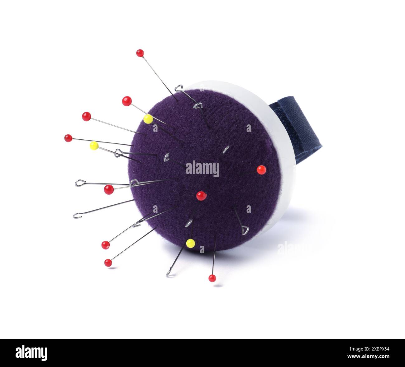 Blue pincushion with sewing pins isolated on white Stock Photo - Alamy