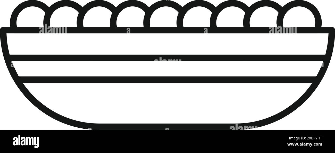 Bowl is overflowing with delicious round chocolate candy on a white ...