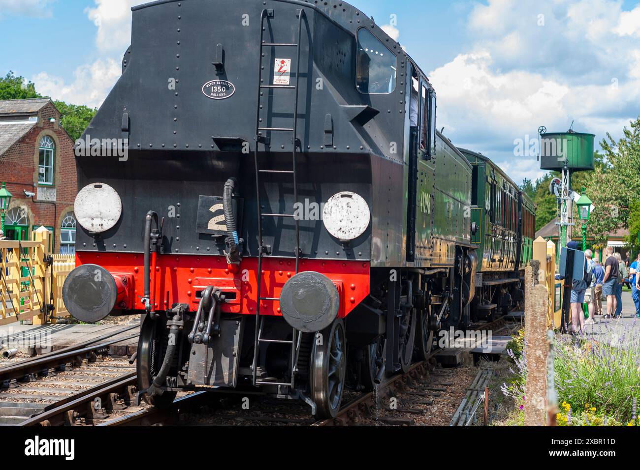 Steam locomotive IVATT CLASS 2, No 41298, haulng a train out of ...