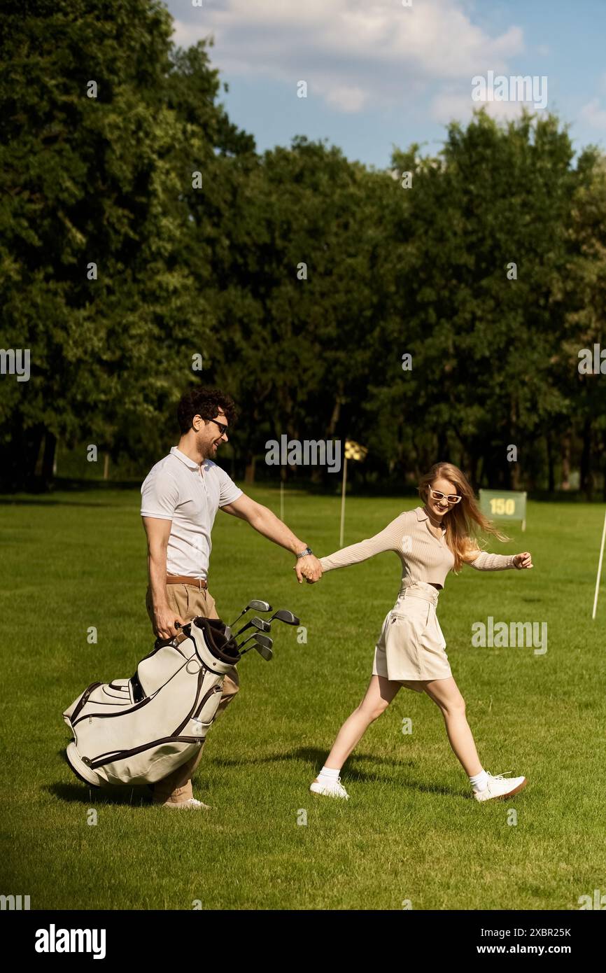A stylish couple in elegant attire hold hands while walking leisurely ...