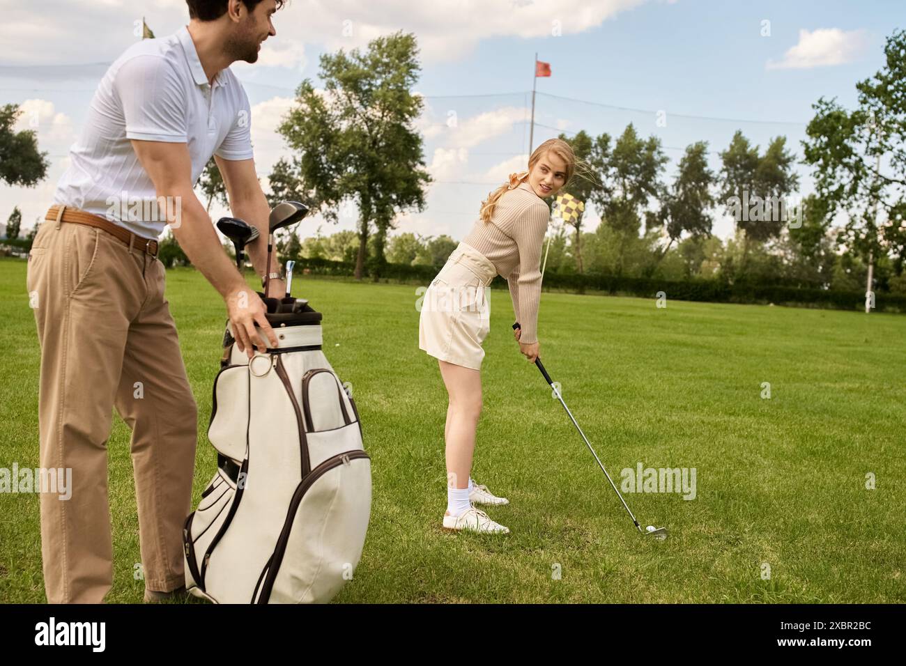 Beautiful young blonde golf hi-res stock photography and images - Alamy