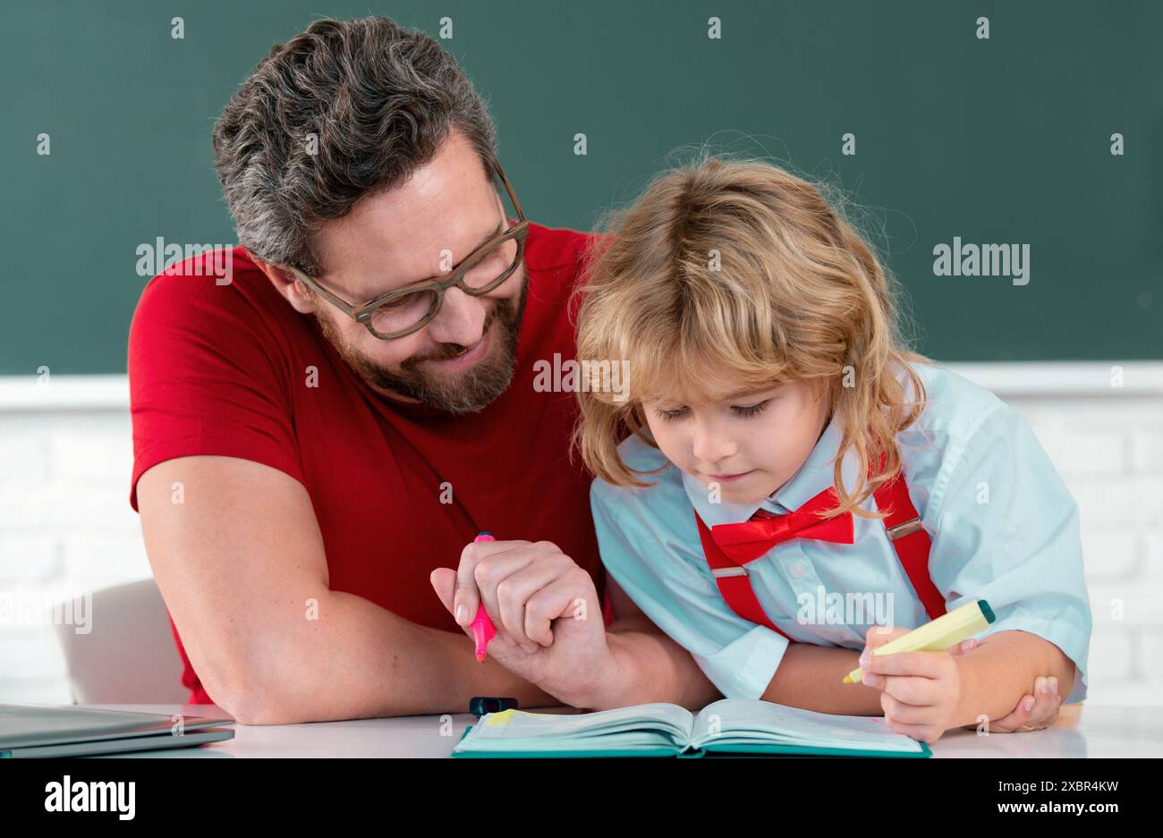 School kid and teacher learning study in class. Nerd elementary school ...