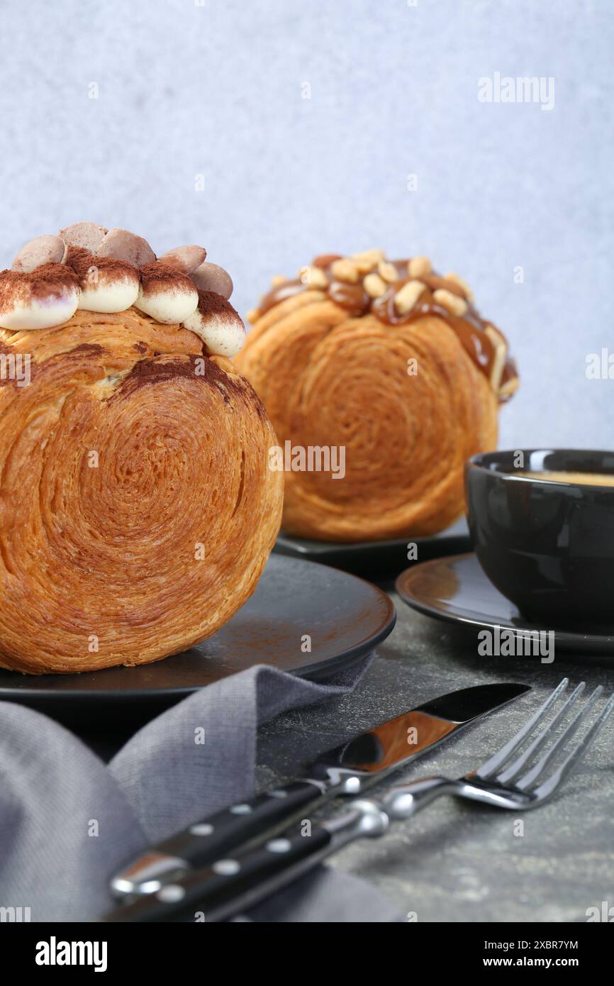 Crunchy round croissants served on grey table. Tasty puff pastry Stock ...