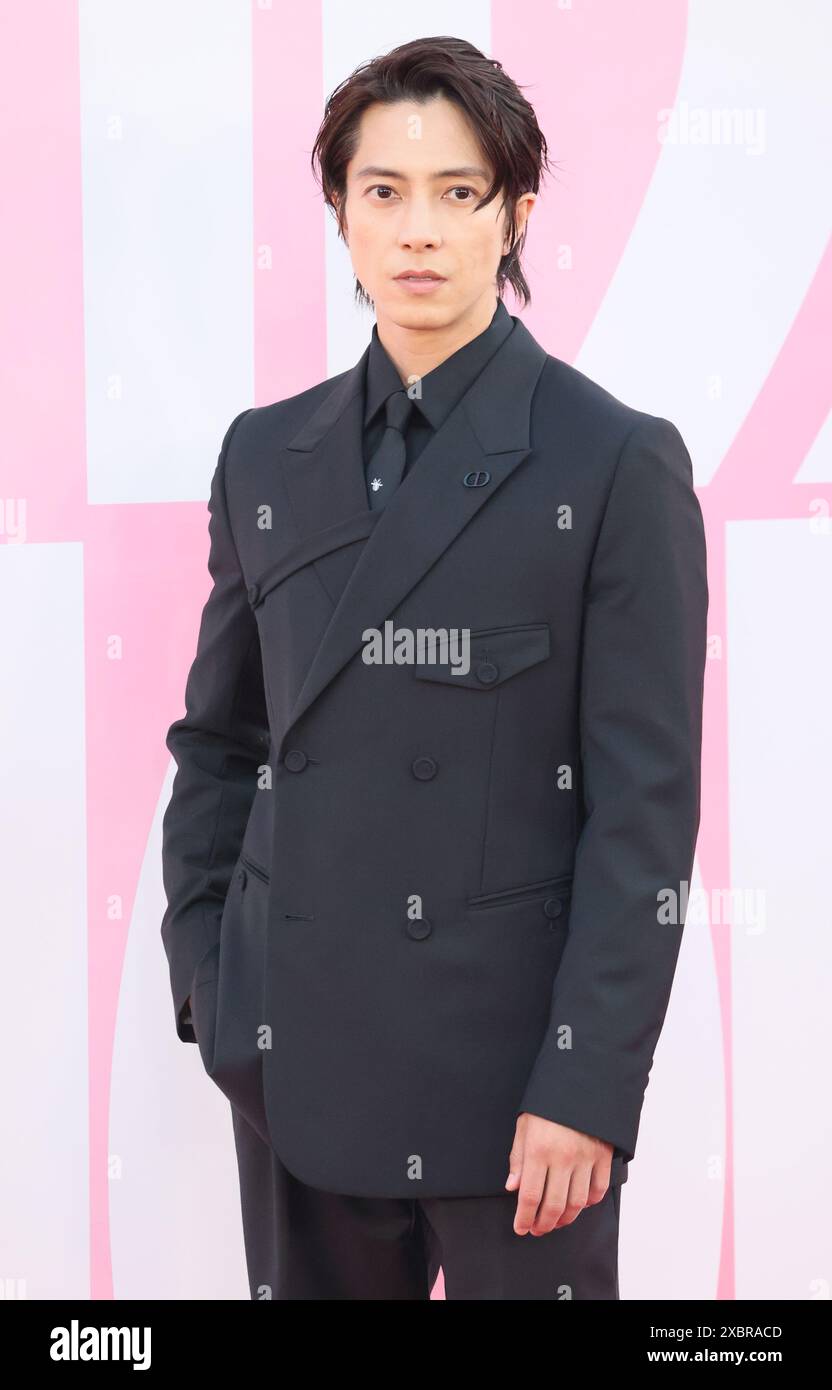 Tokyo, Japan. 12th June, 2024. Japanese actor Tomohisa Yamashita poses ...