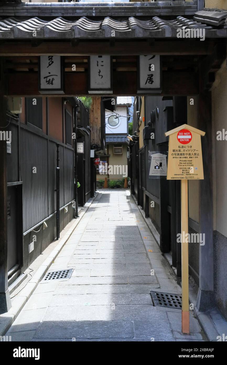 A sign warning "Entry and photography by tourists and guided tours is ...