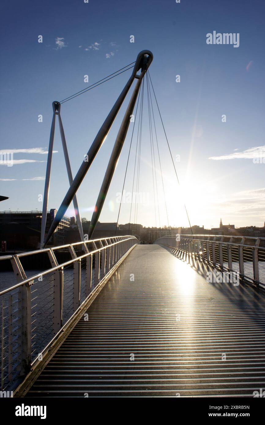 Iconic pedestrian cable stayed footbridge over the river Usk at Newport ...