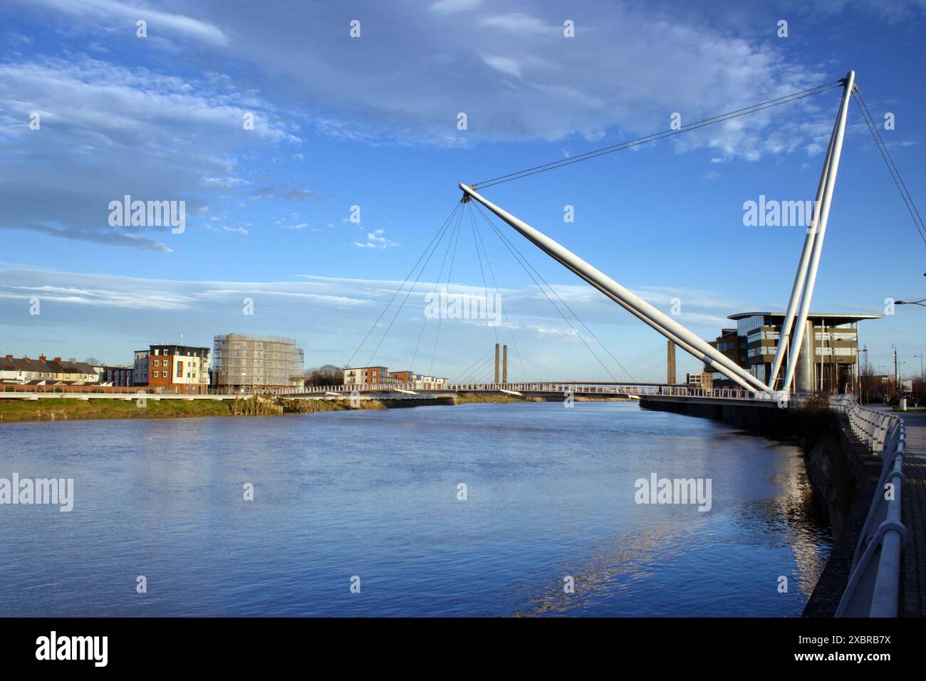 Iconic pedestrian cable stayed footbridge over the river Usk at Newport ...