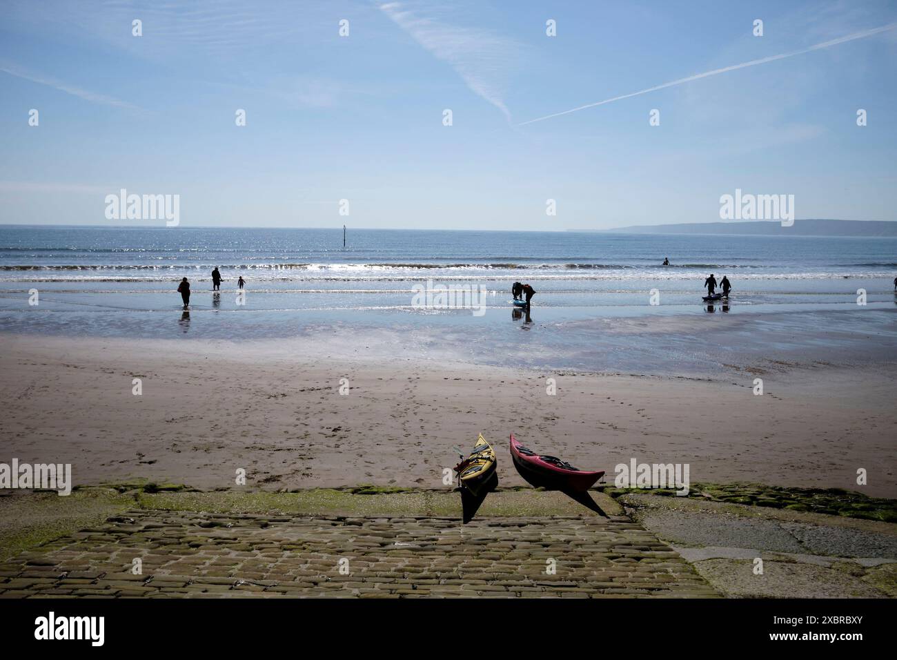 Kayakers at the northern beach off the Cobble Landing at Filey, North ...