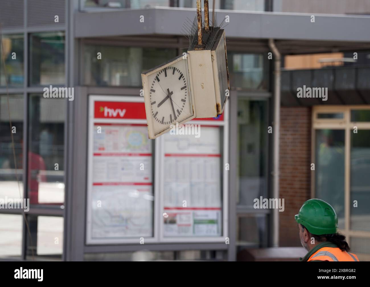 05 June 2024, Hamburg: A construction worker walks across the building ...