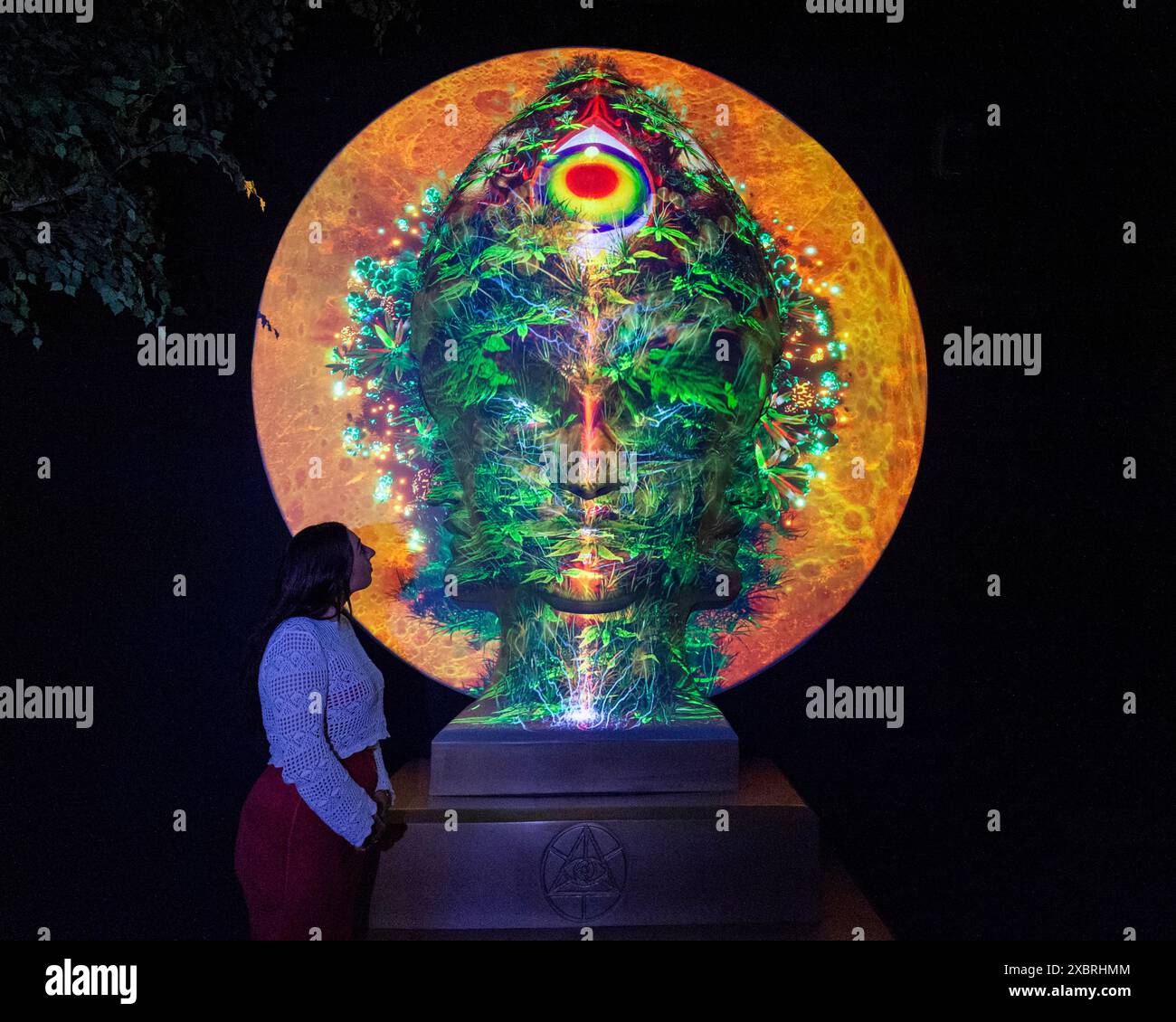 London, UK. 13 June 2024. A staff member in Room 3: 'Steeple Head’: a ...