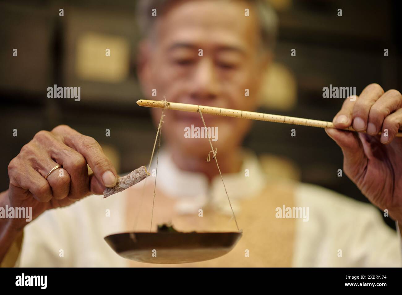 Man using balance scale hi-res stock photography and images - Alamy