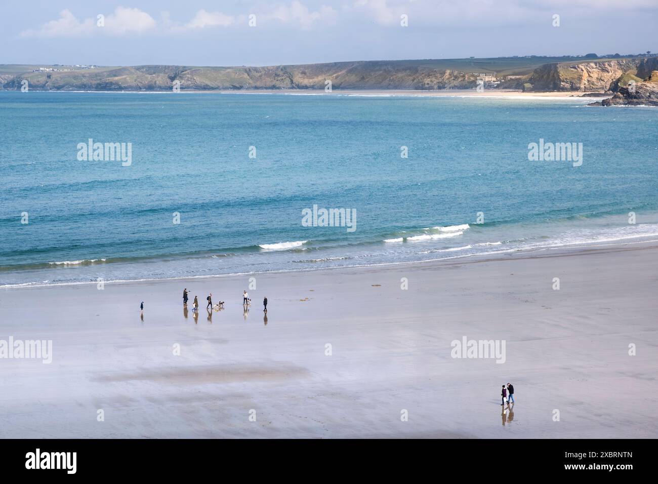 People on Towan Beach at low tide In Newquay in Cornwall in the UK ...