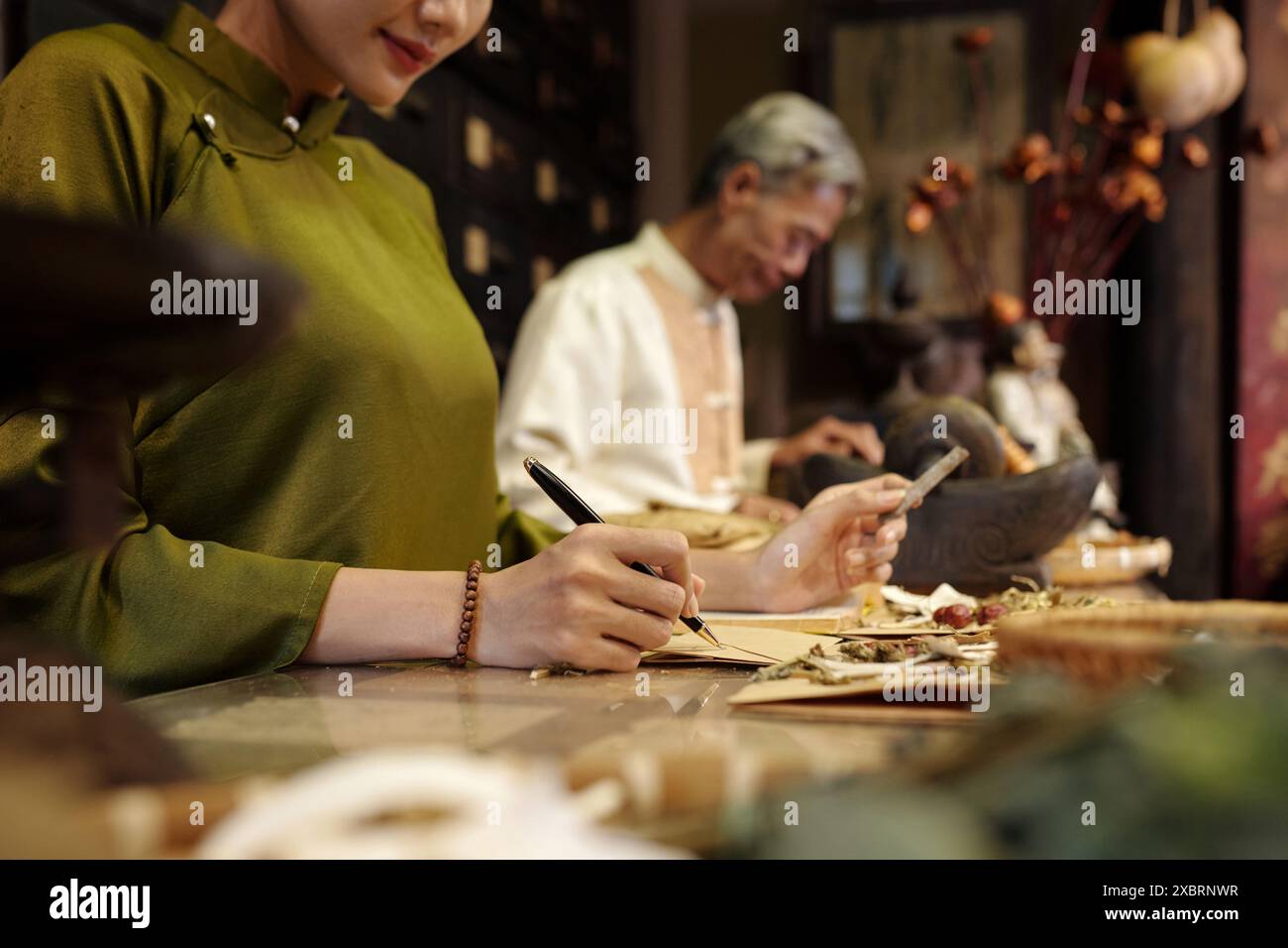 Woman writing recipe from hi-res stock photography and images - Alamy