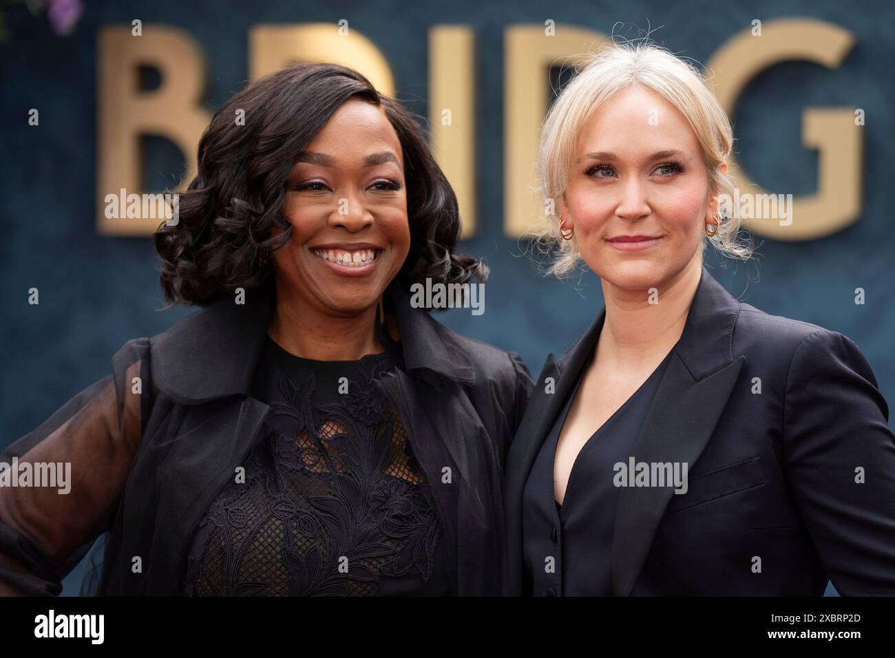 Shonda Rhimes, left, and Jess Brownell pose for photographers upon ...