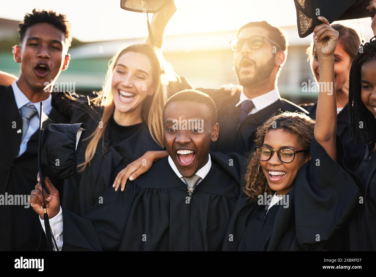 Group, people and diversity at college graduation, happiness for degree ...