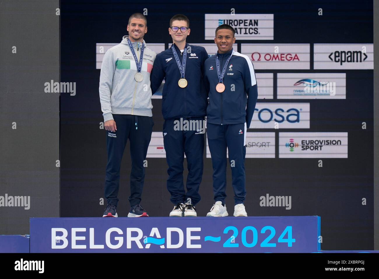 Britain's Ranjuo Tomblin, centre, celebrates his gold medal with silver ...