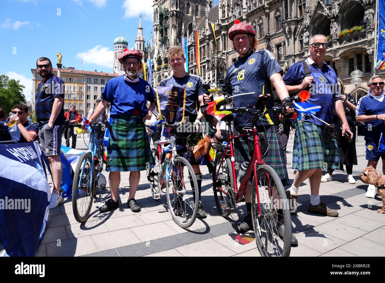 Scotland fan Ethan Walker (centre), who has cycled 1,200km to watch his ...
