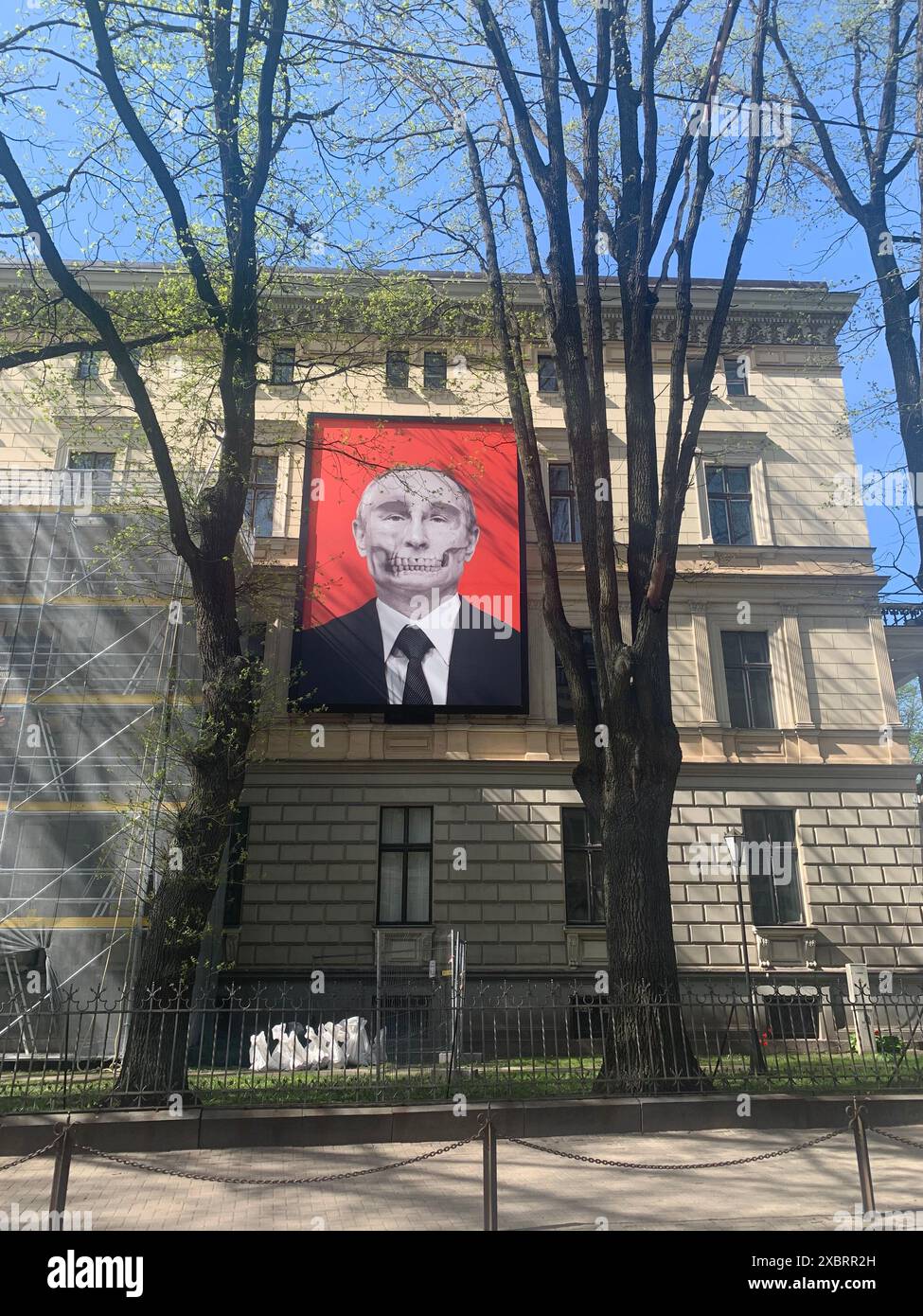 Riga, Latvia, May 2, 2024: Large format poster at housefacade of ...