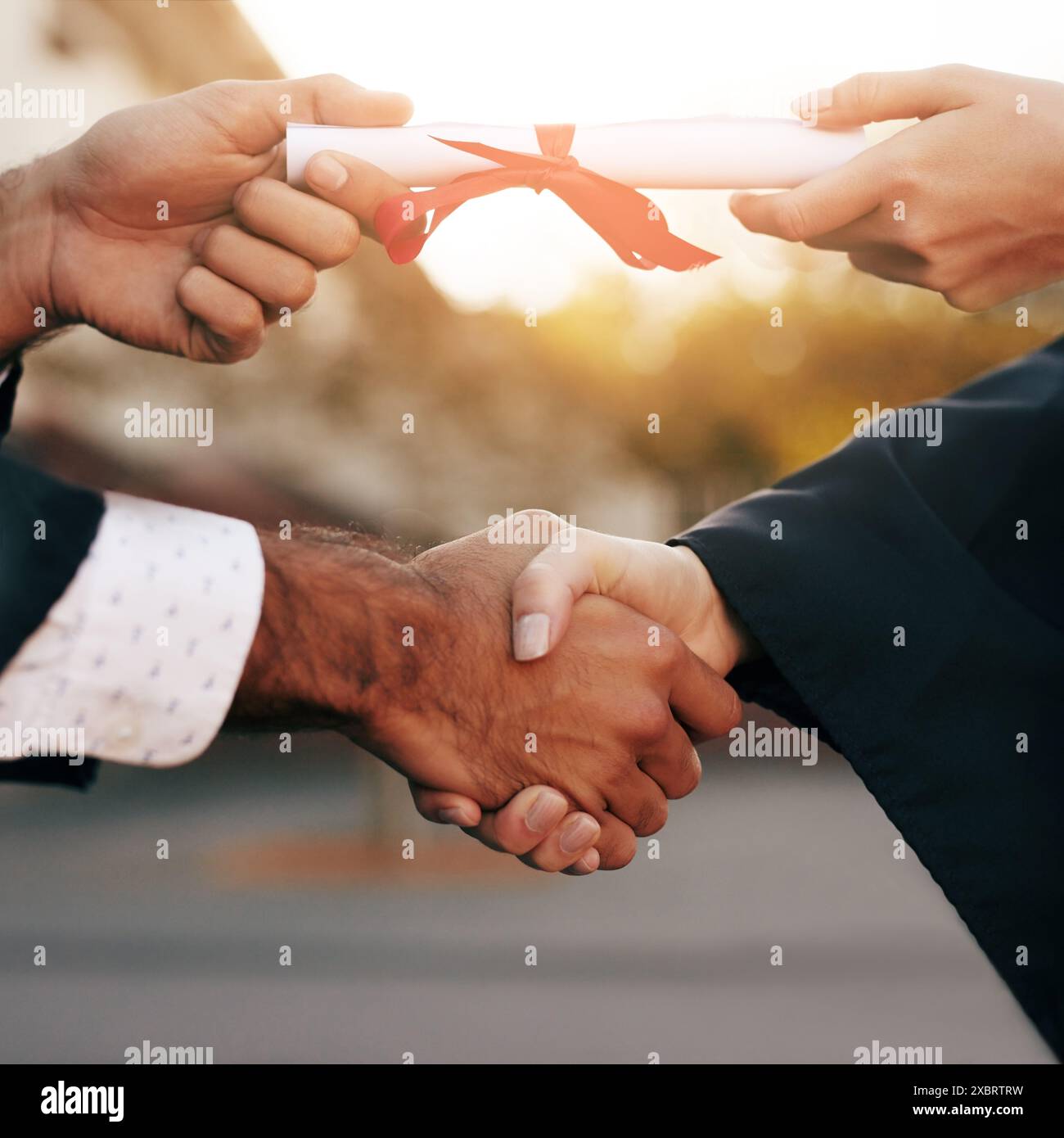 University, graduation and diploma handshake or hands, student and ...