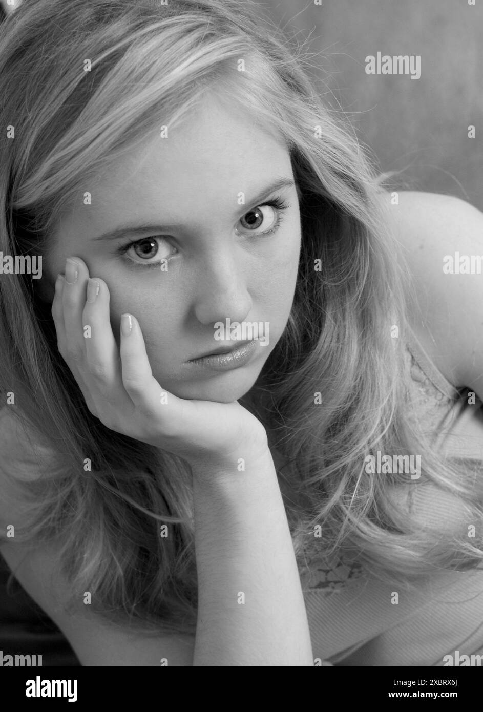 Close-up of a pensive Caucasian teen girl, USA Stock Photo - Alamy