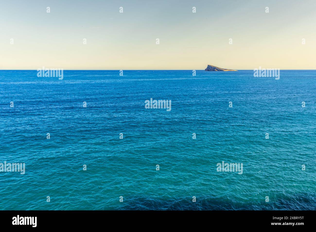The image captures a peaceful seascape featuring the Mediterranean Sea ...