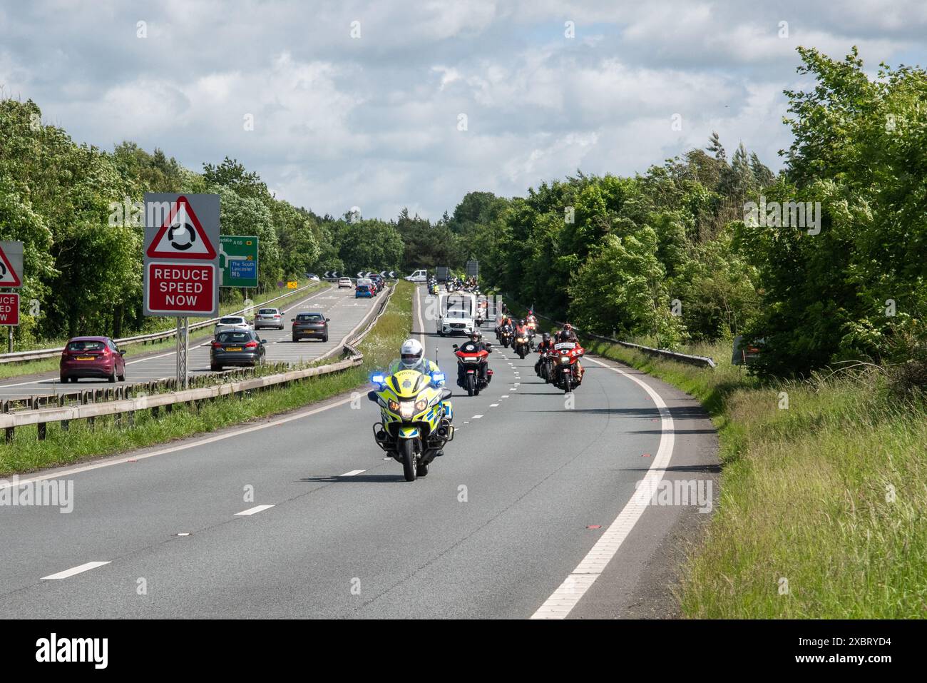 Motorcycles on the "Dave Day" ride on the A591, Cumbria. "Dave Day" saw ...